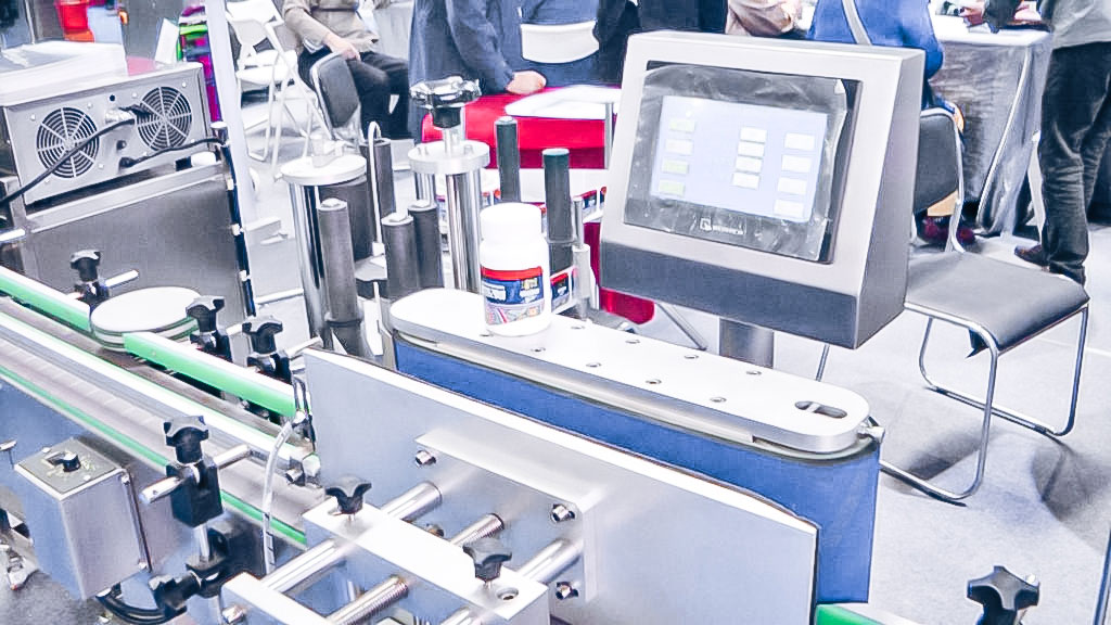 Automatic labeling equipment for plastic and glass bottles | THE WORLD ...